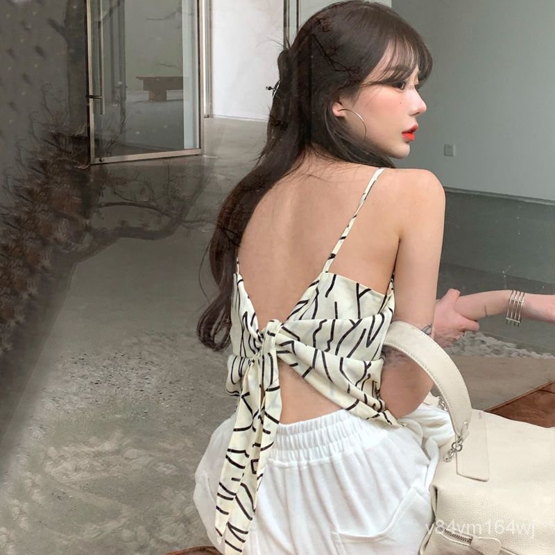 【蜜糖小姐の小店】不規則弔帶背心女2022春夏新款辣妹蝴蝶結設計感小衆內搭外穿上衣jioyh EGOH | 蝦皮購物
