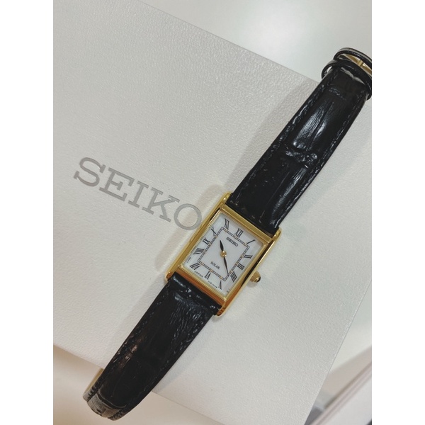 Seiko solar SUP250 光動能 羅馬數字 氣質 真皮錶帶 白色錶盤 方錶 女錶 | 蝦皮購物