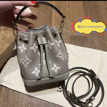 超商 LOUIS VUITTON 路易威登 LV nano noe mini 大象灰奶白色壓紋抽繩水桶包M46291 | 蝦皮購物