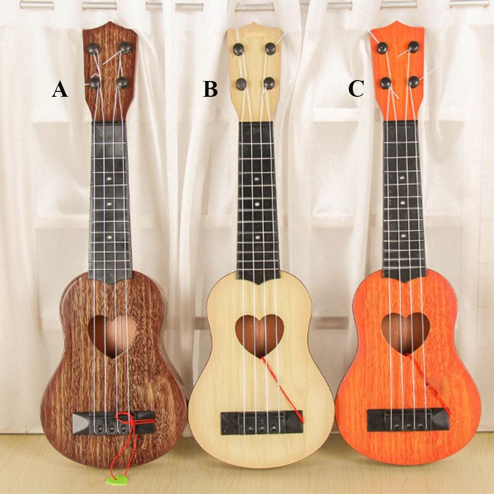 Four Strings Ukulele Mini Guitar Ukelele Acoustic guitar Hea | 蝦皮購物