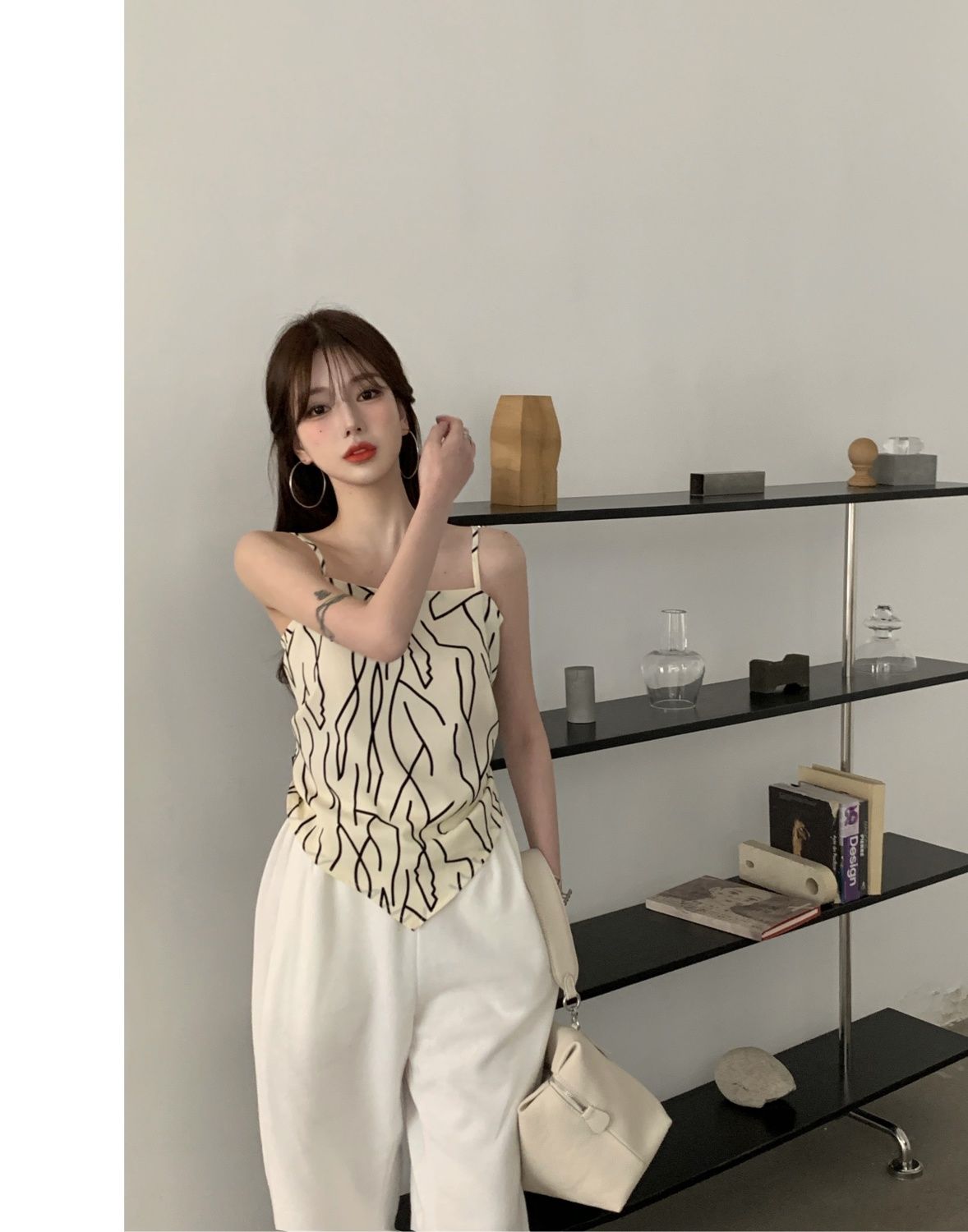 【蜜糖小姐の小店】不規則弔帶背心女2022春夏新款辣妹蝴蝶結設計感小衆內搭外穿上衣jioyh EGOH | 蝦皮購物